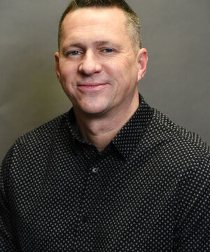 Tom Ackerman, Vice President, Advancement and Head Women's Volleyball Coach